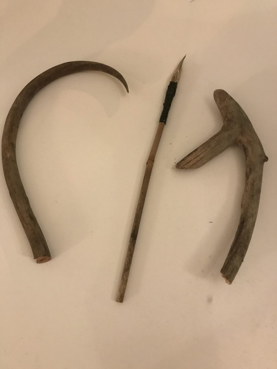 Two sickles and a brush by Peyo – Wolf Brother